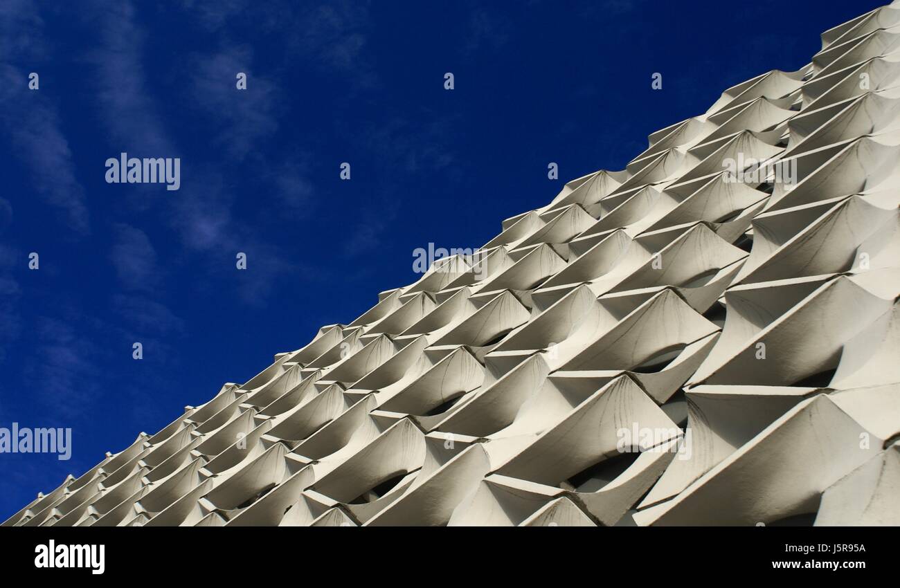 blue house building waves facade saxony sunshine design shaping ...