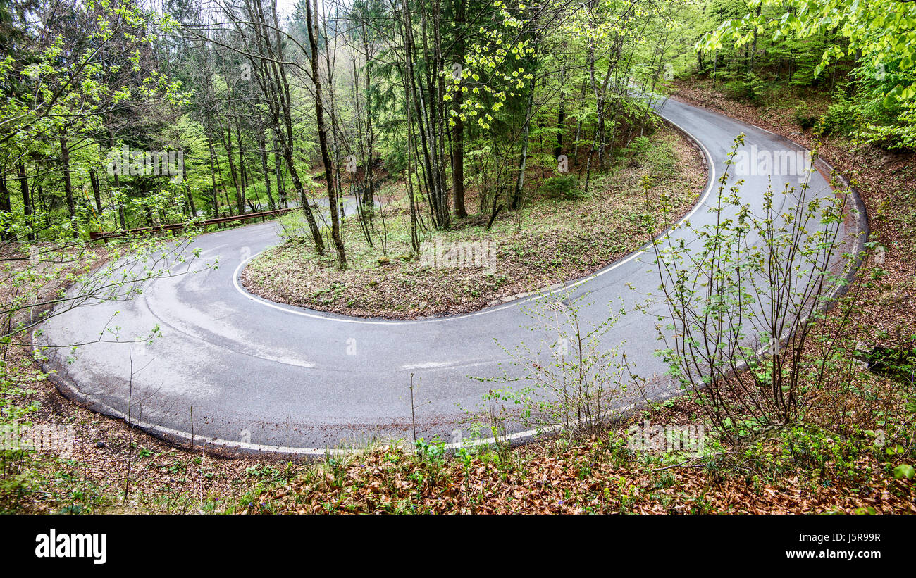 hairpin bend of mountain road - outdoor activity and spring season ...