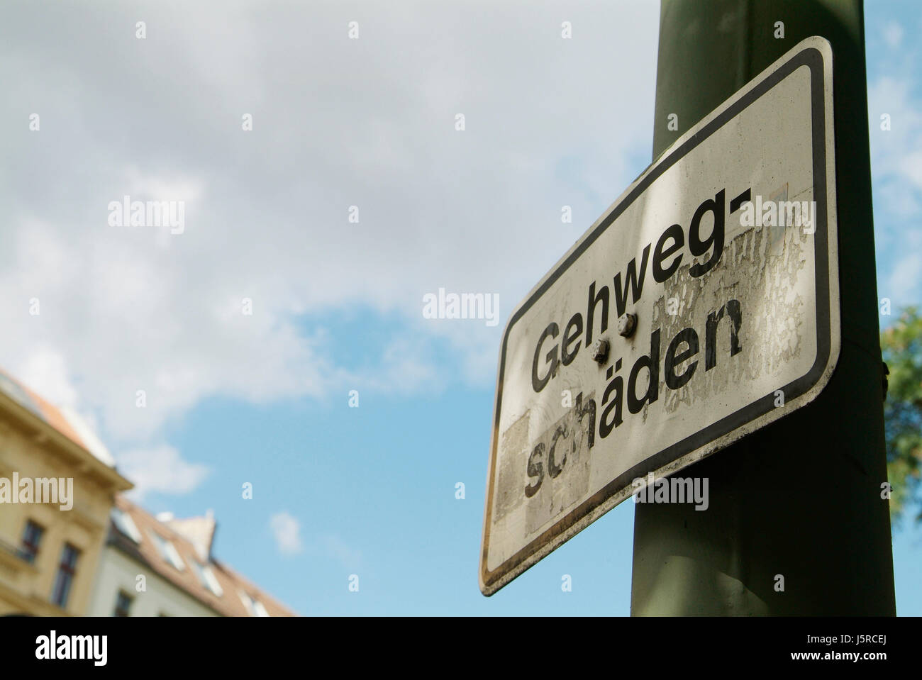 sign pavement damage Stock Photo - Alamy