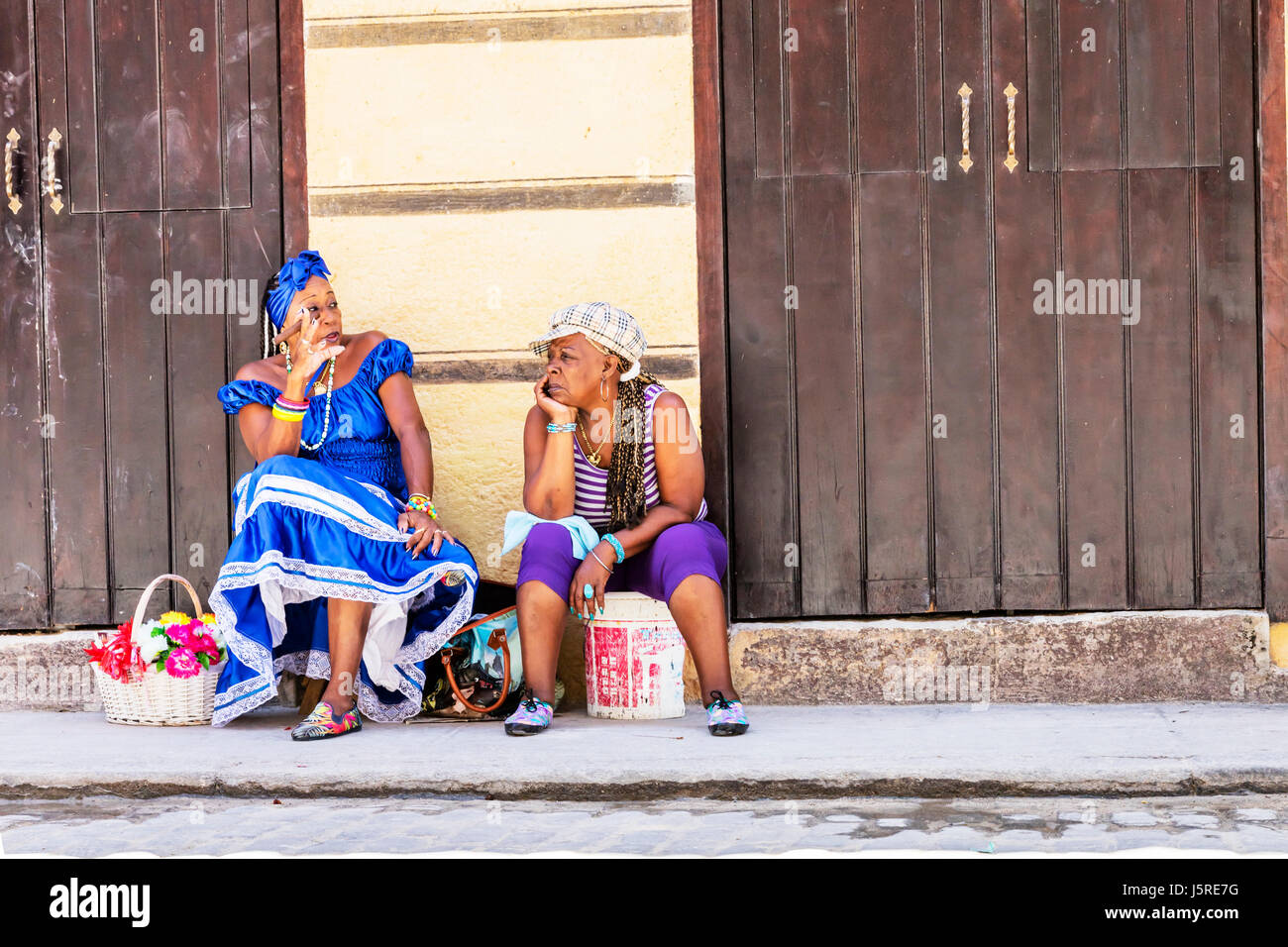 Cuban woman wearing traditional costume in the Plaza de la Catedral ...