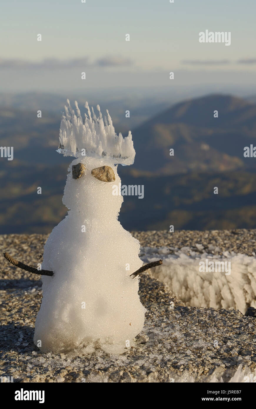 a cool snowman with standing hairstyle Stock Photo - Alamy