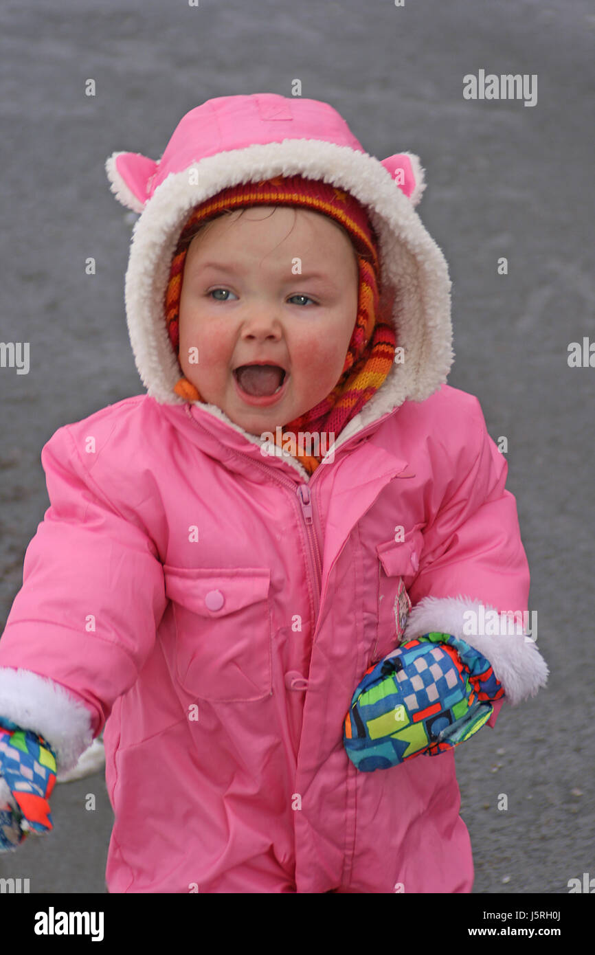Pink snowsuit hi-res stock photography and images - Alamy