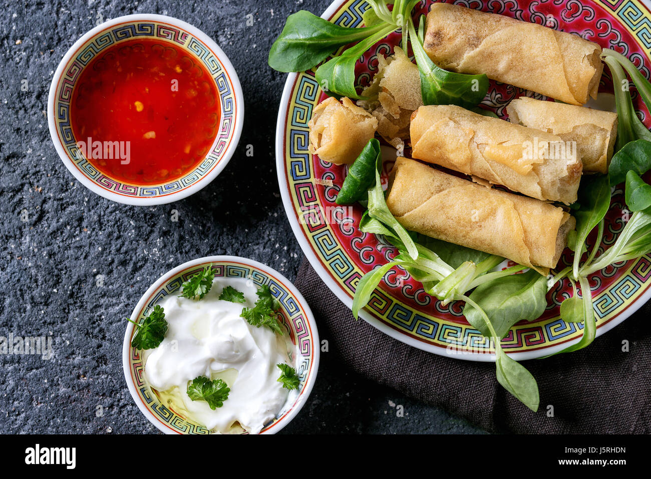 Fried spring rolls with sauce Stock Photo - Alamy