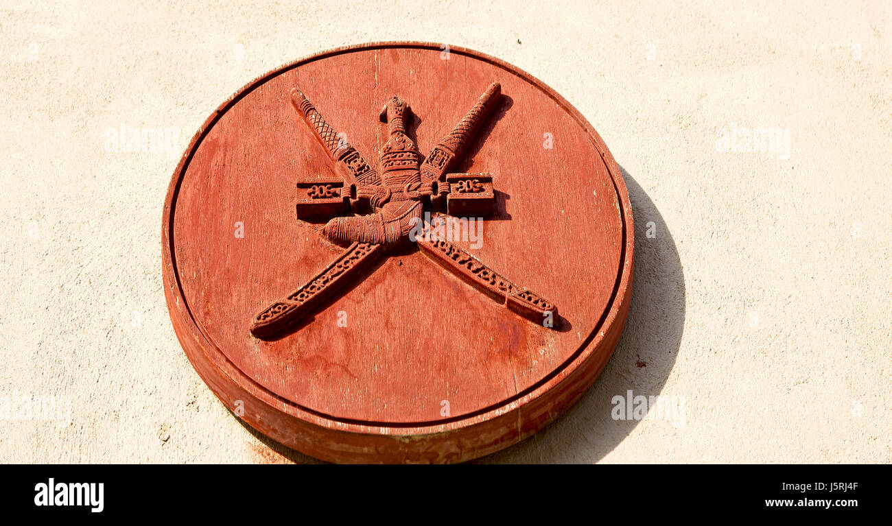 in oman the national emblem wood made and the wall Stock Photo - Alamy