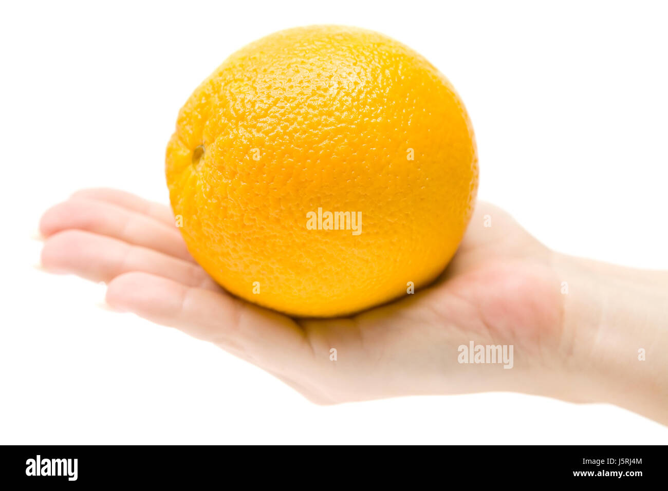 orange in hand Stock Photo - Alamy
