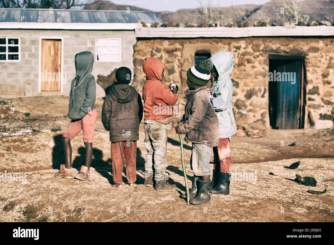 in africa group of alone children near their poor home Stock Photo - Alamy