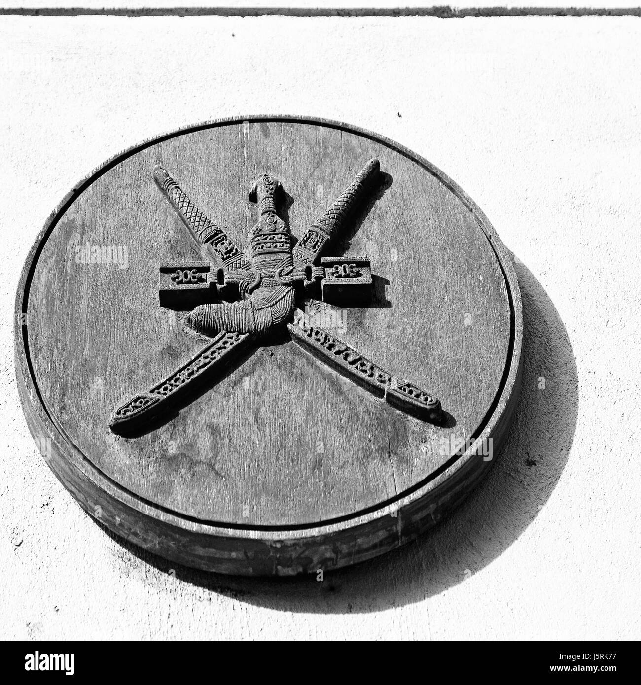 in oman the national emblem wood made and the wall Stock Photo - Alamy