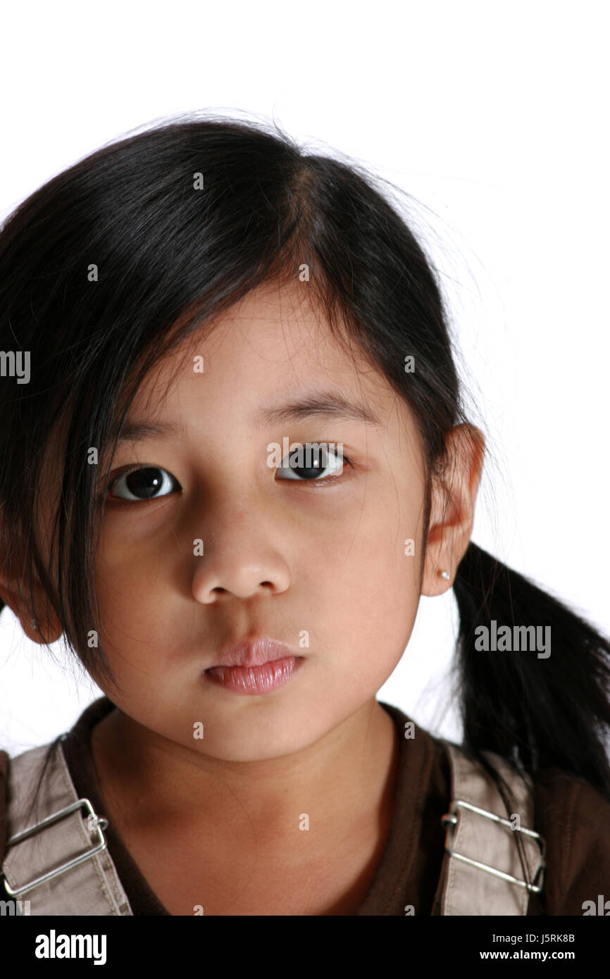 young girl with pouty face Stock Photo - Alamy