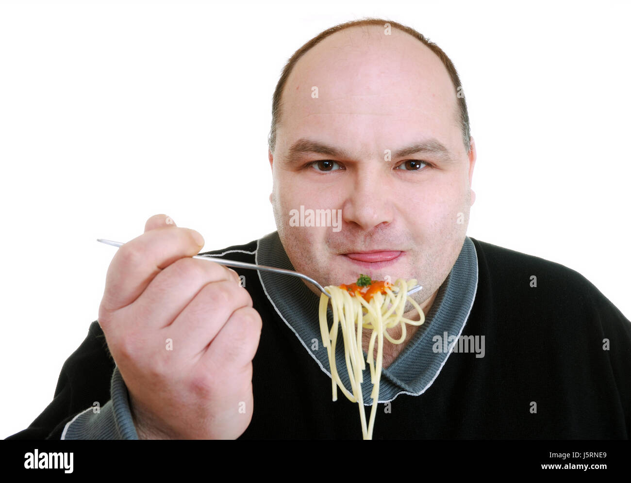 Man eating spaghetti isolated hi-res stock photography and images - Alamy