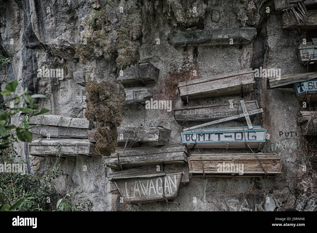 in philipphines the typical hanging cemetery in the mountain cliff ...