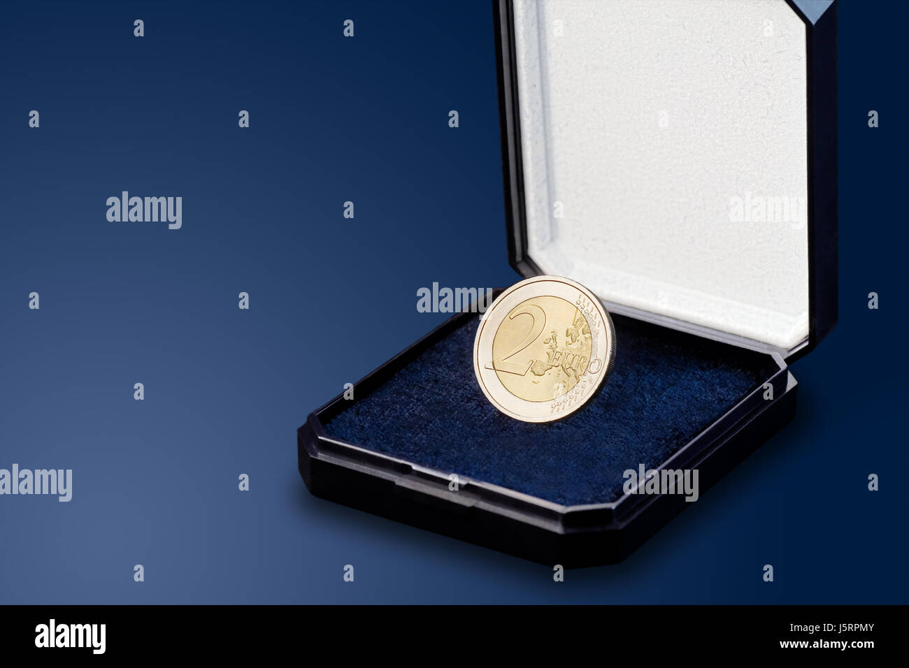 2-euro coin in box Stock Photo - Alamy