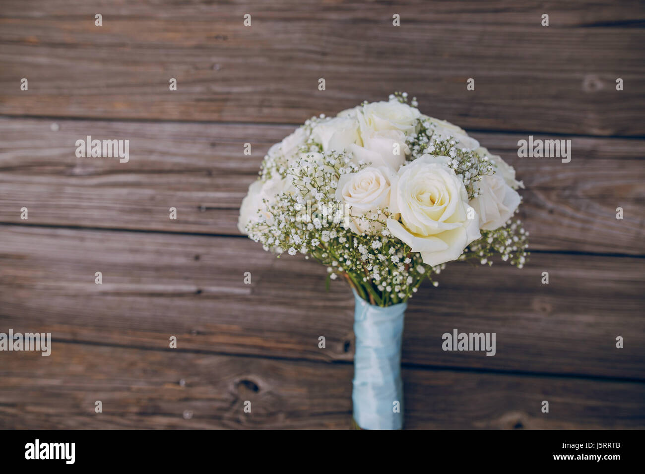 Wedding bouquet standing on boards hi-res stock photography and images ...