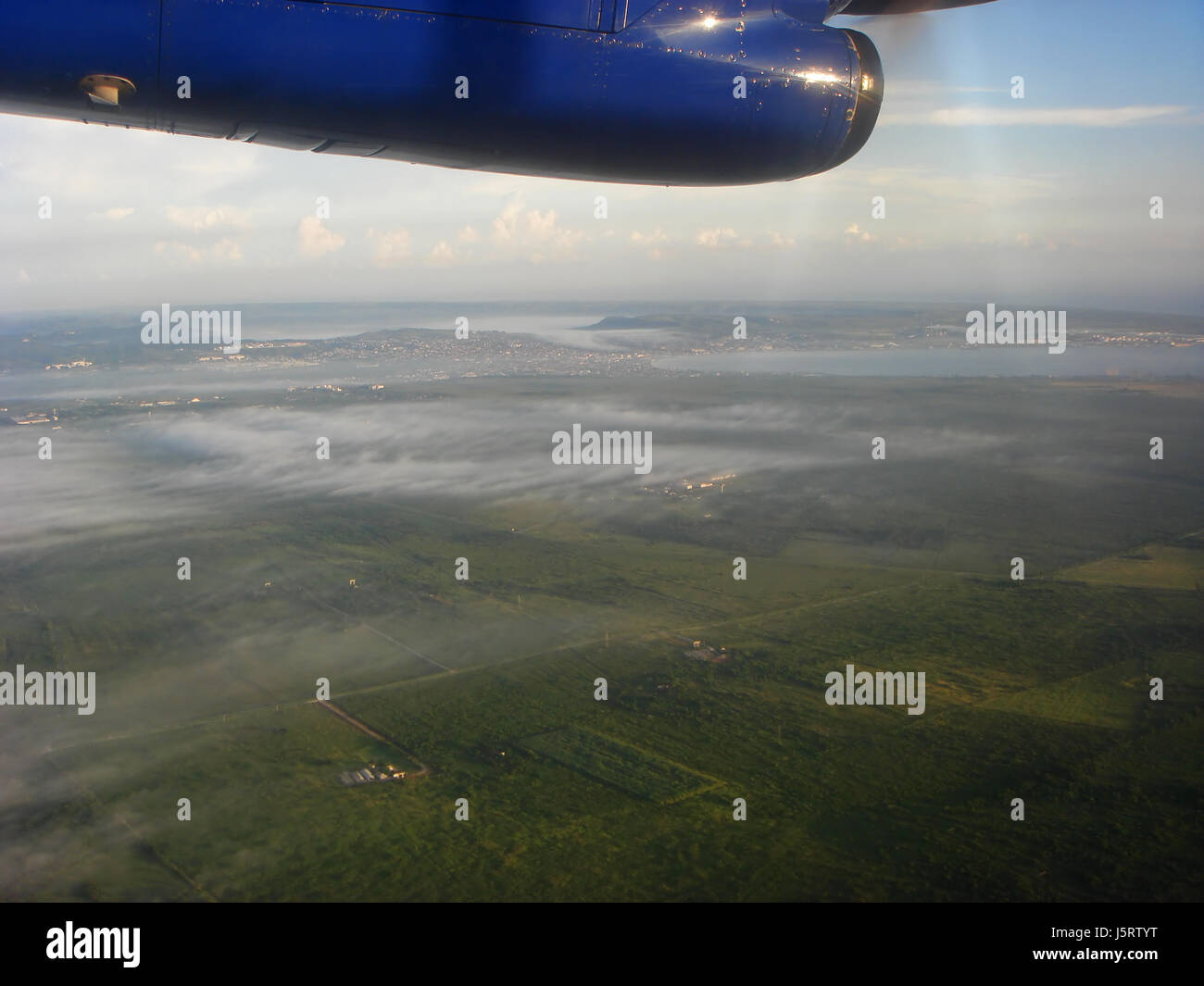 aerial perspective hill flight engine drive motor fog haze propeller ...