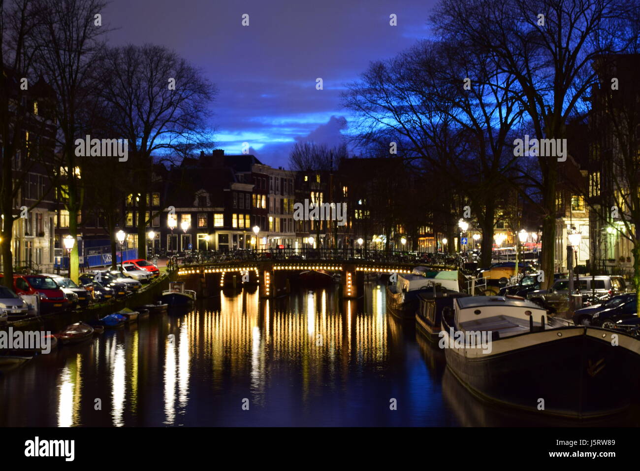 Night time on the canals of Amsterdam, Netherlands Stock Photo - Alamy