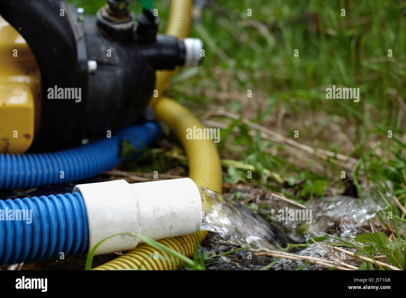 Water Pump In A Garden Stock Photo - Alamy