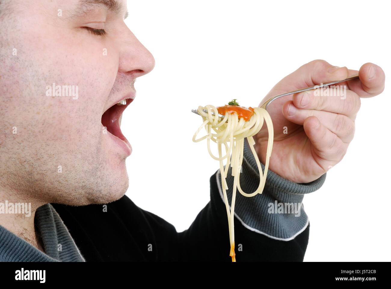 Man eating spaghetti isolated hi-res stock photography and images - Alamy