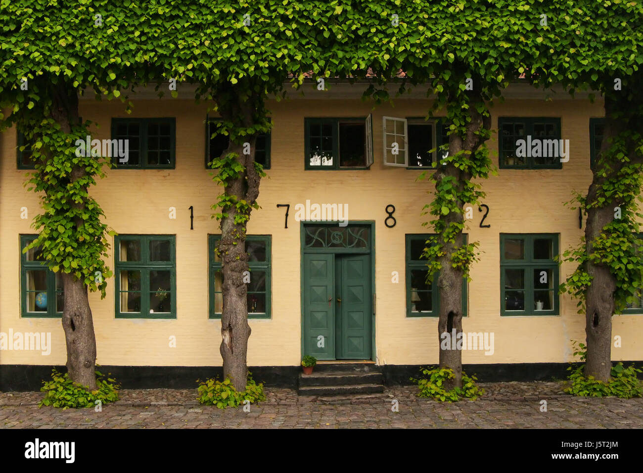 house building tree window porthole dormer window pane entrance door ...