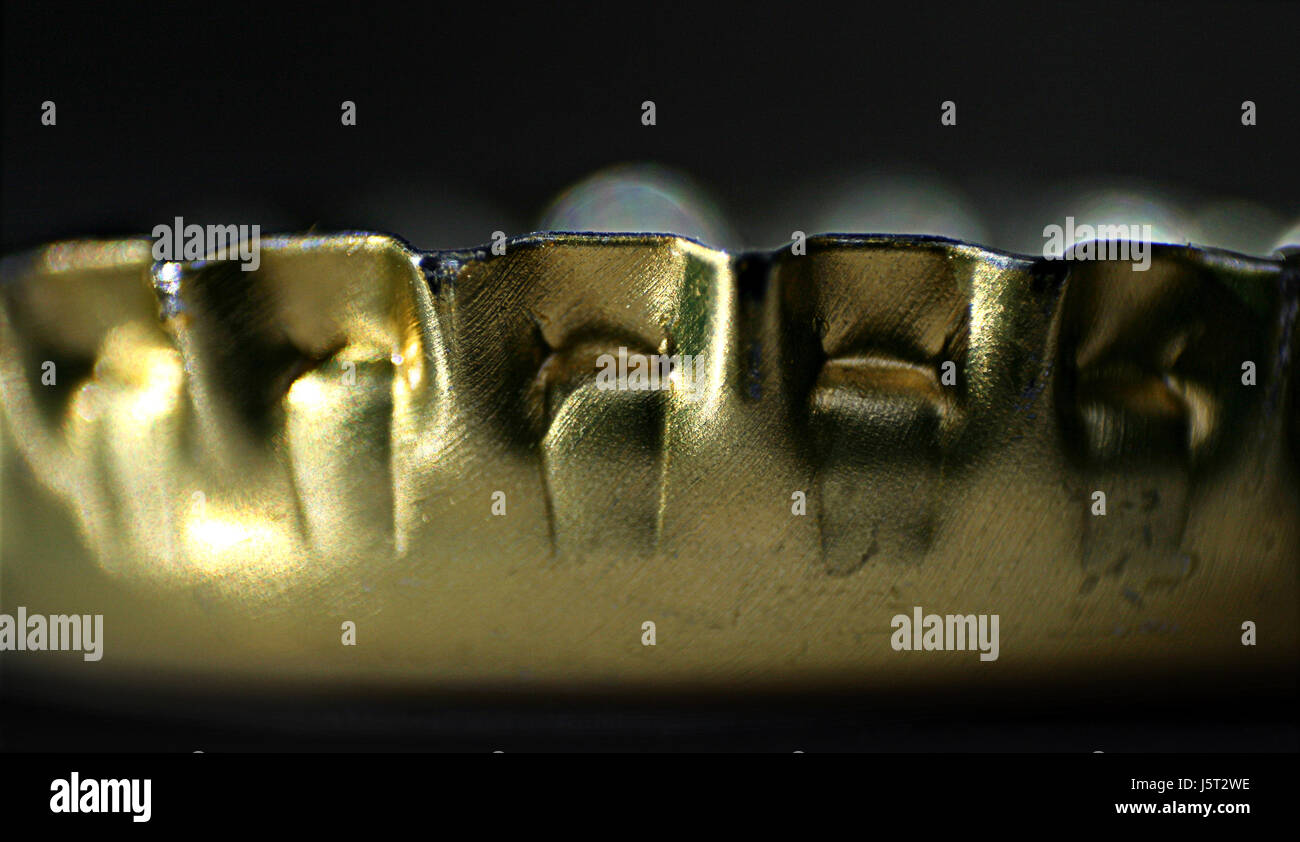 teeth beer seal shutter tooth crown lid beer bottle macro close-up ...