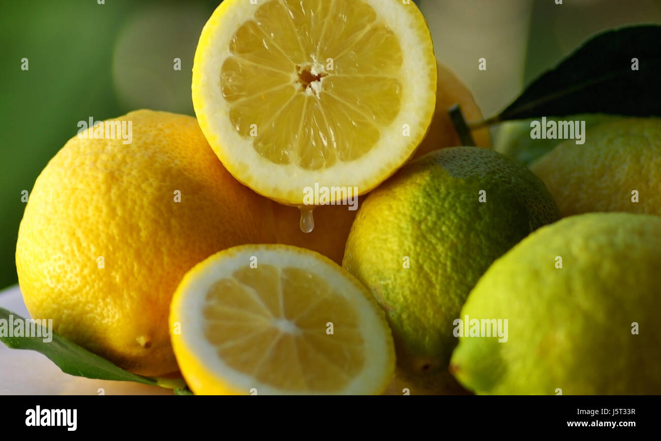 fruit lemons citric half acid citrus yellow food aliment leaf health ...