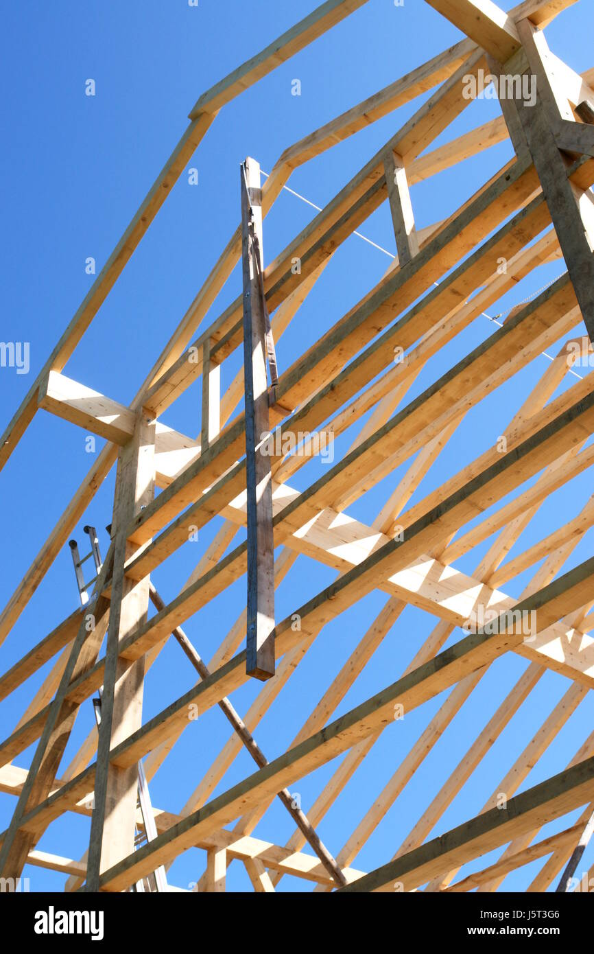 wood scaffold scaffolding house-build construction site blue wood beam ...
