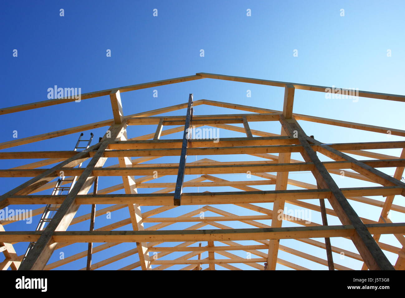 wood scaffold scaffolding house-build construction site blue wood beam ...