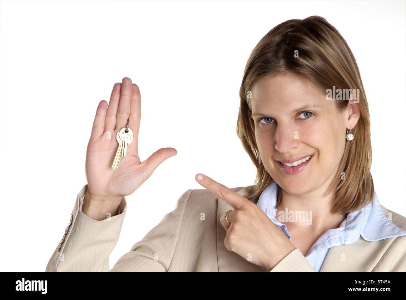 woman shows key Stock Photo - Alamy