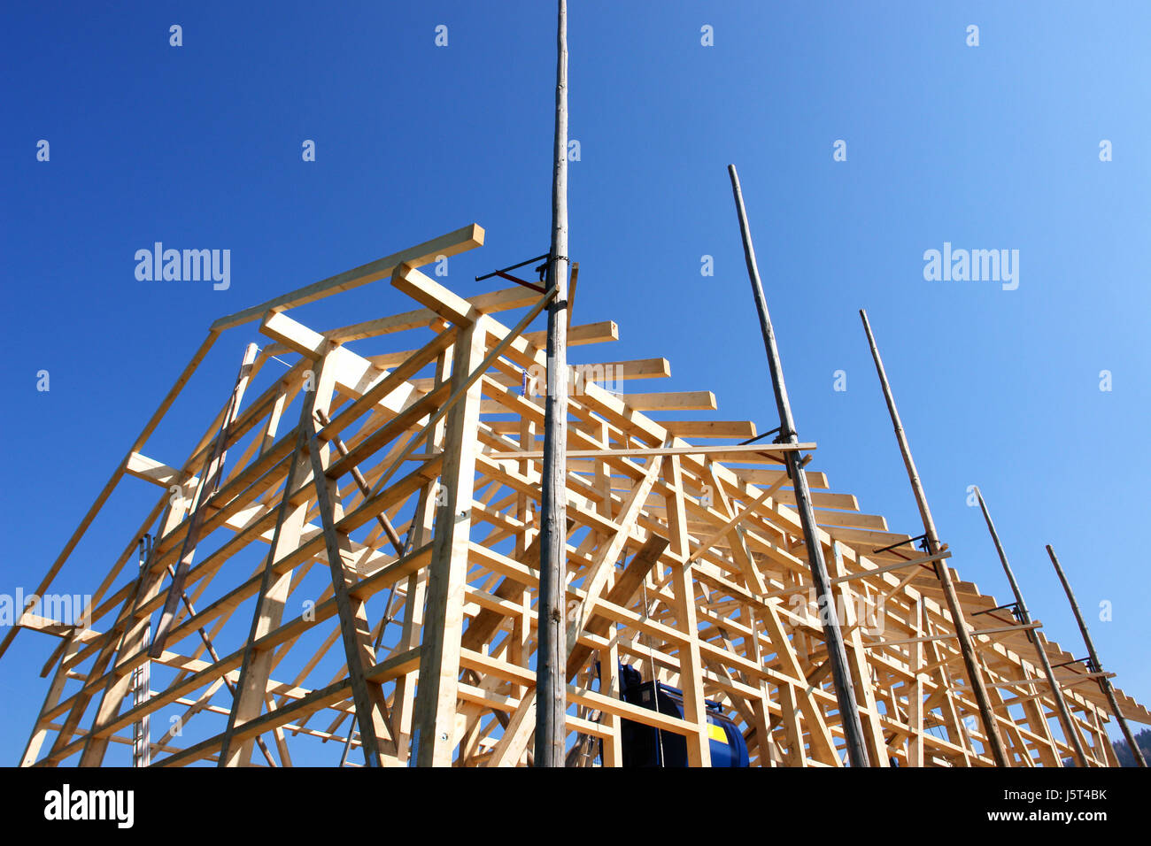 wood scaffold scaffolding house-build construction site blue wood beam ...
