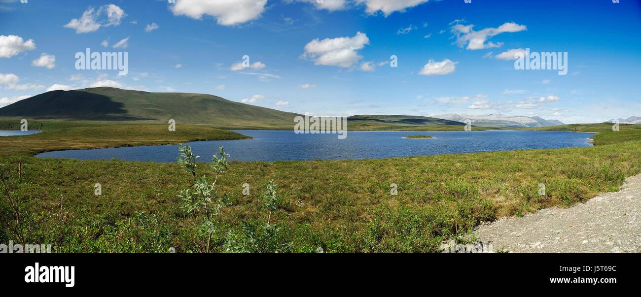 mountains gravel alaska firmament sky salt water sea ocean water clouds ...