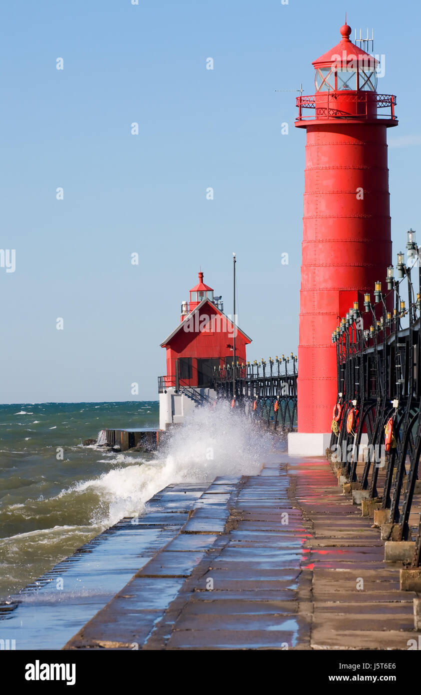 splash lighthouse red water tower navigation rough waves current pier ...