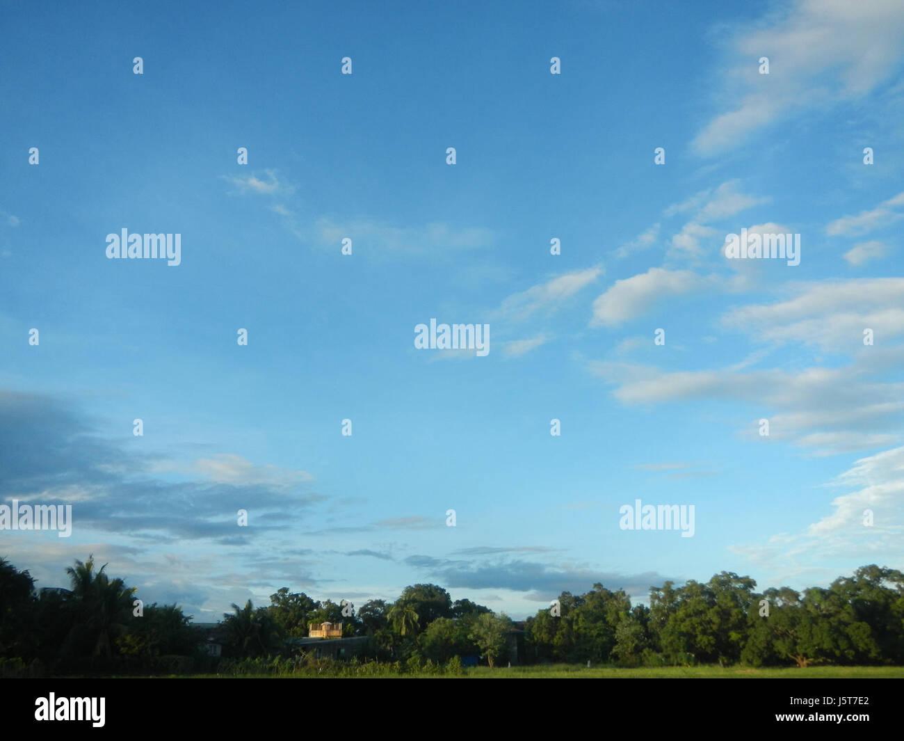 This image captures a stunning sunset view of the Bocaue River Bridge ...