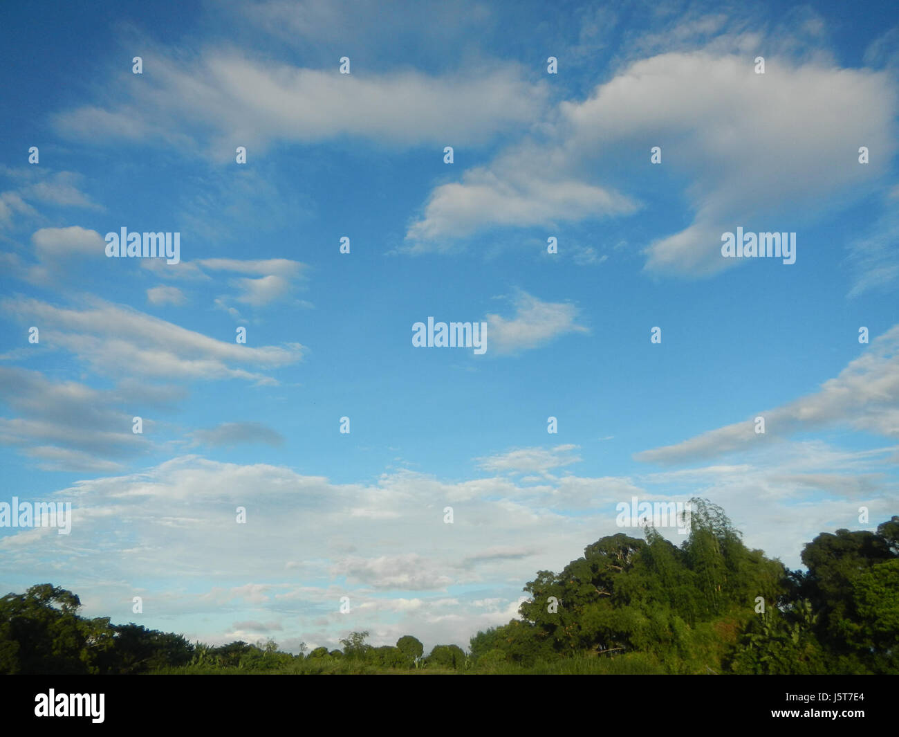 This image captures a beautiful sunset view of the Bocaue River Bridge ...