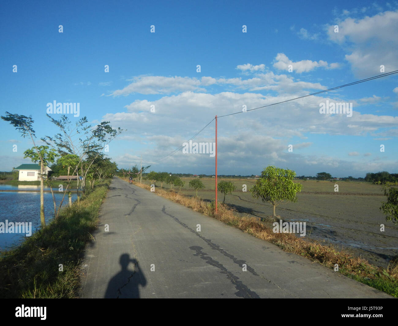 The image captures the rural landscape of San Simon, Pampanga ...