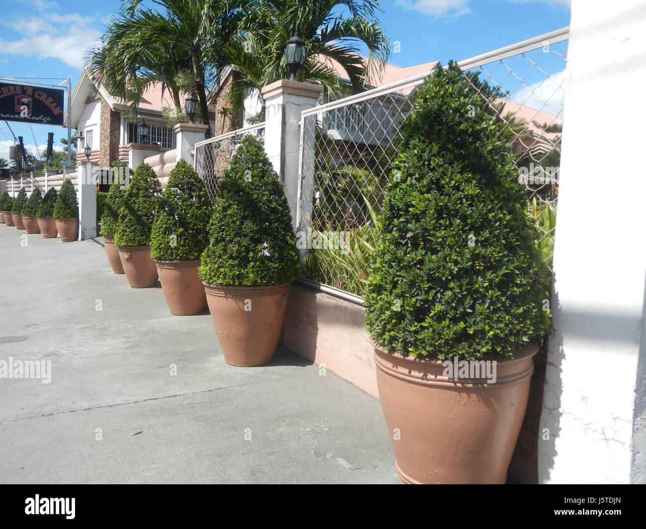 This image shows a stretch of the MacArthur Highway passing through ...