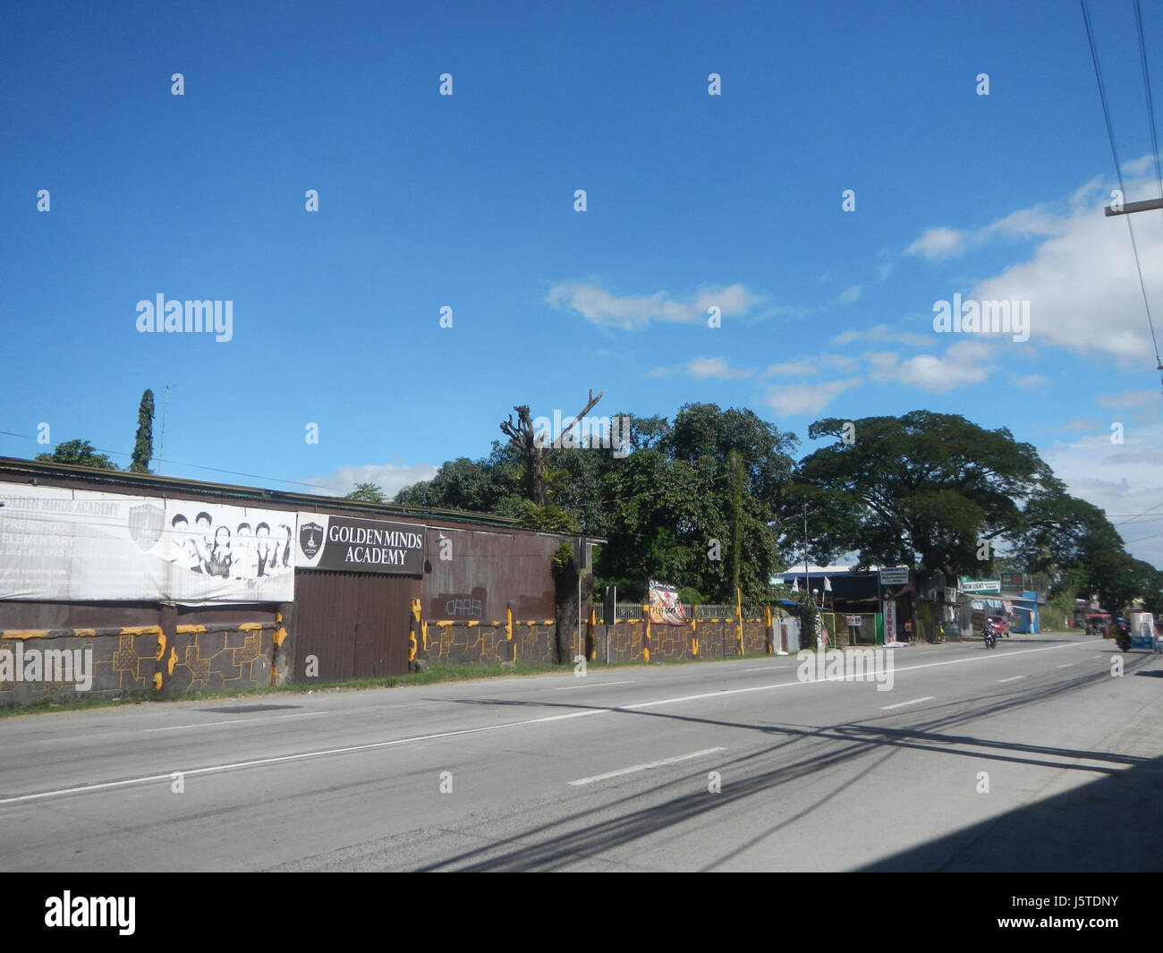 This photograph shows the MacArthur Highway in the Malolos-Guiguinto ...