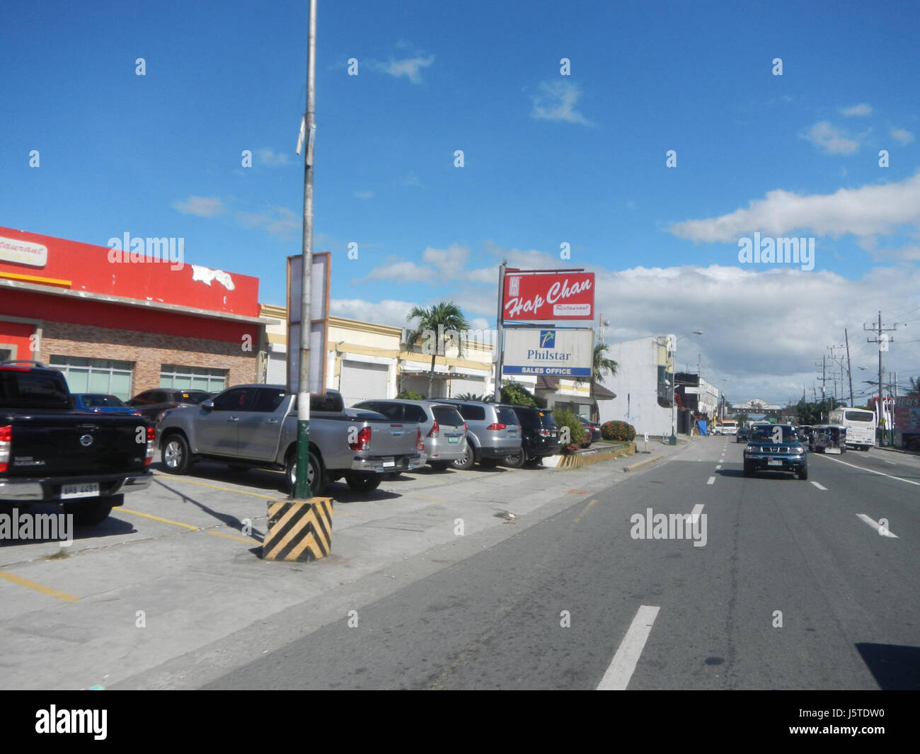 This image shows a section of the MacArthur Highway, a key road ...