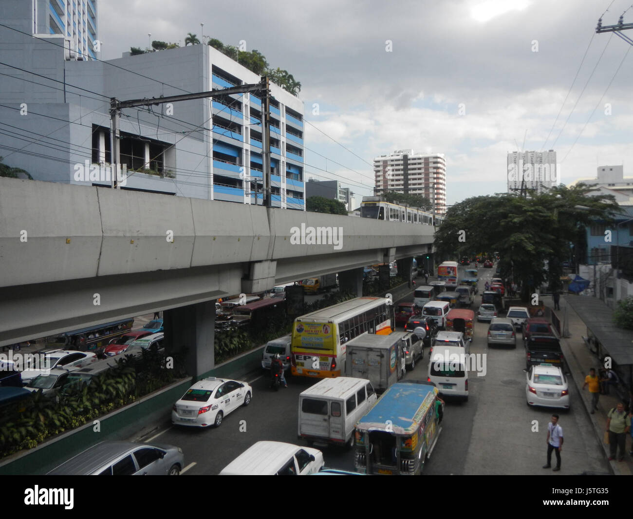 This image depicts the intersection of Taft Avenue and Padre Faura Street in Ermita, Manila ...