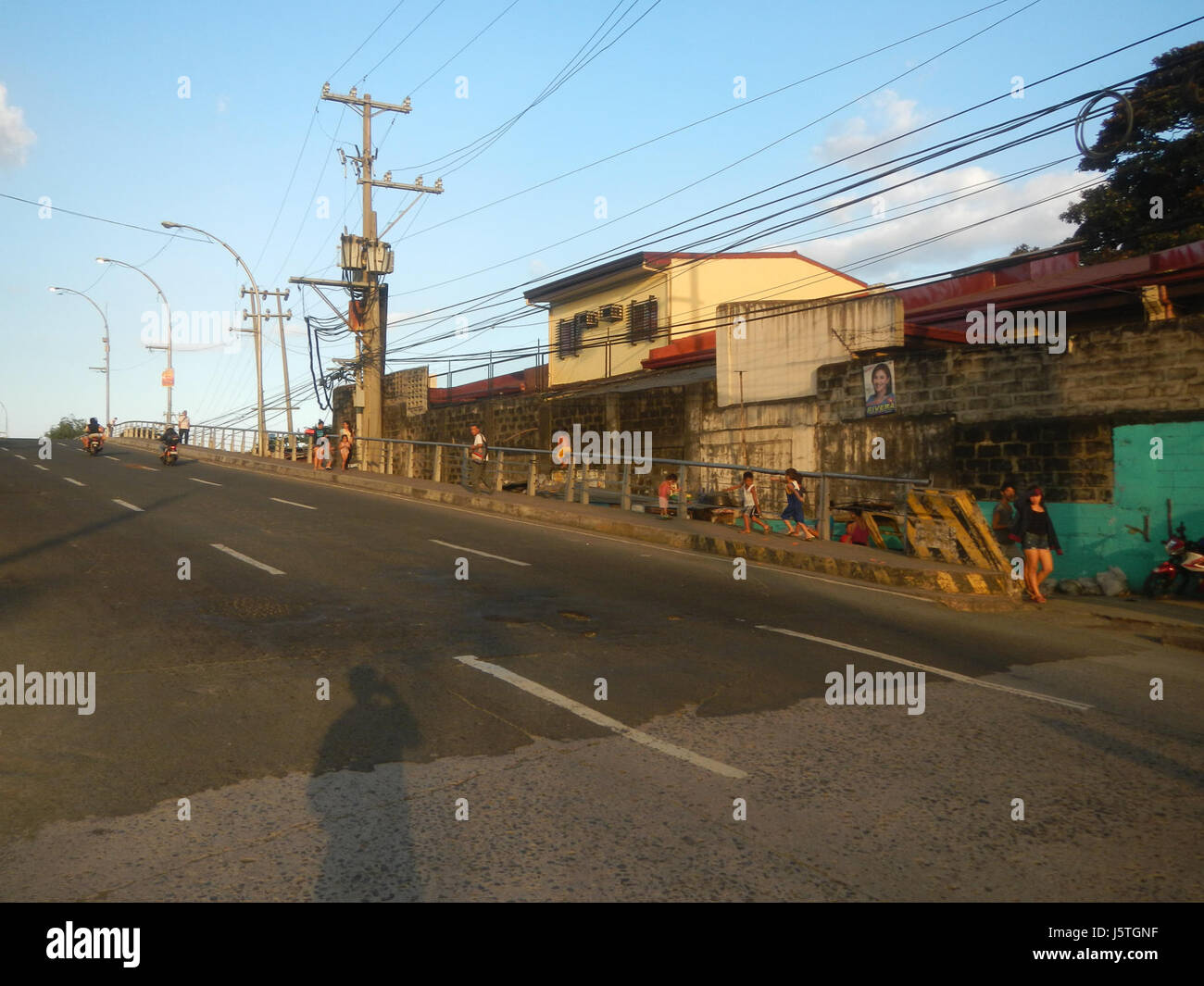 This image shows the Lambingan Bridge in Manila, with Maynilad Water ...