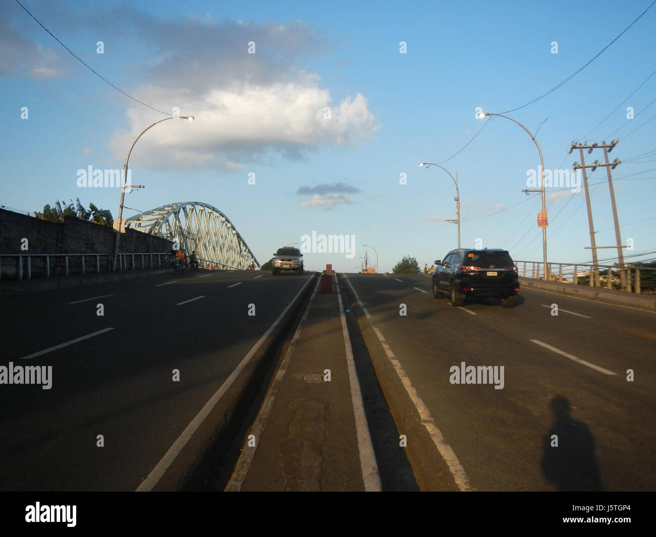 The Lambingan Bridge spans the Pasig River in Santa Ana, Manila ...