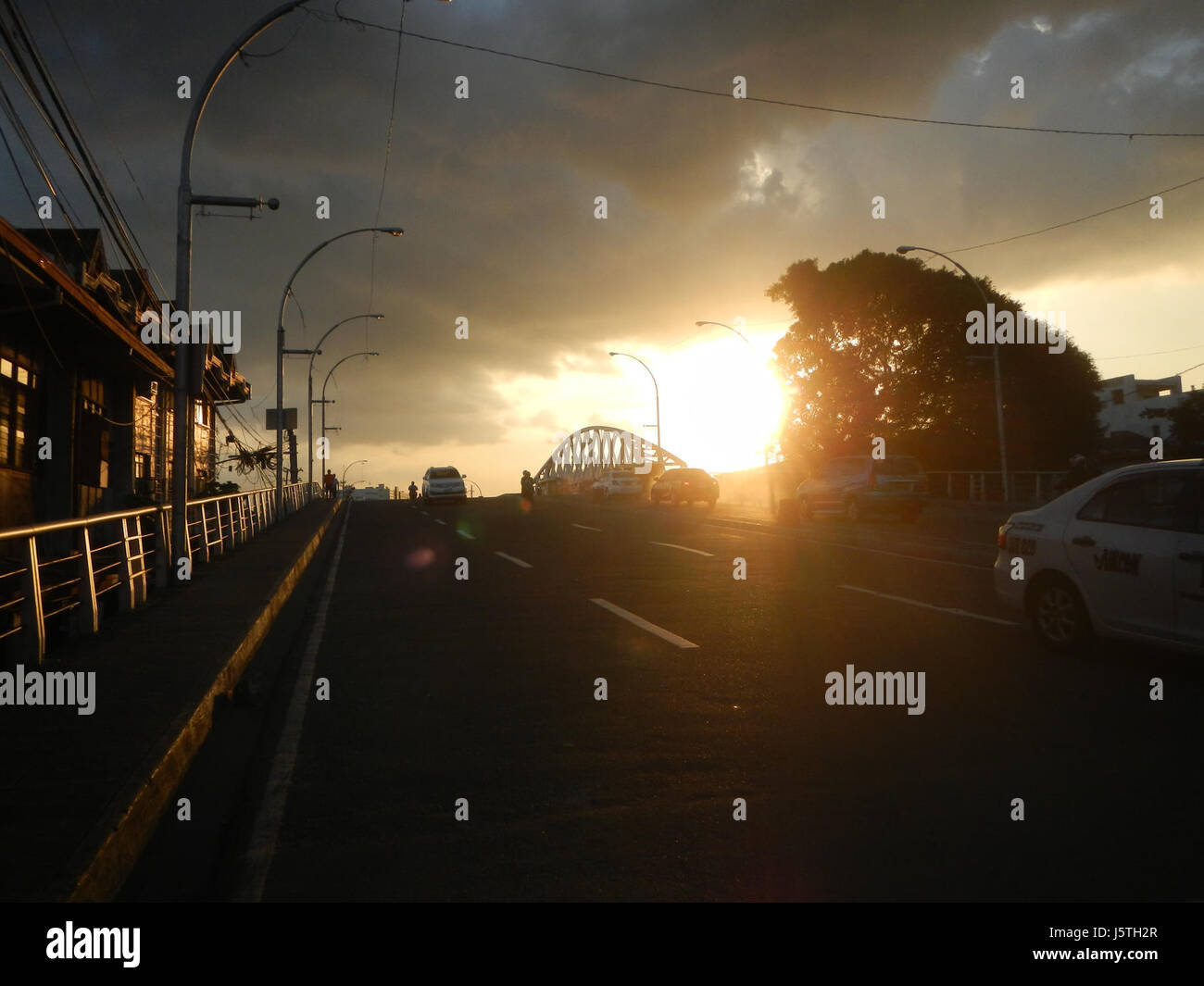 This image depicts Lambingan Bridge, located over the Pasig River in ...
