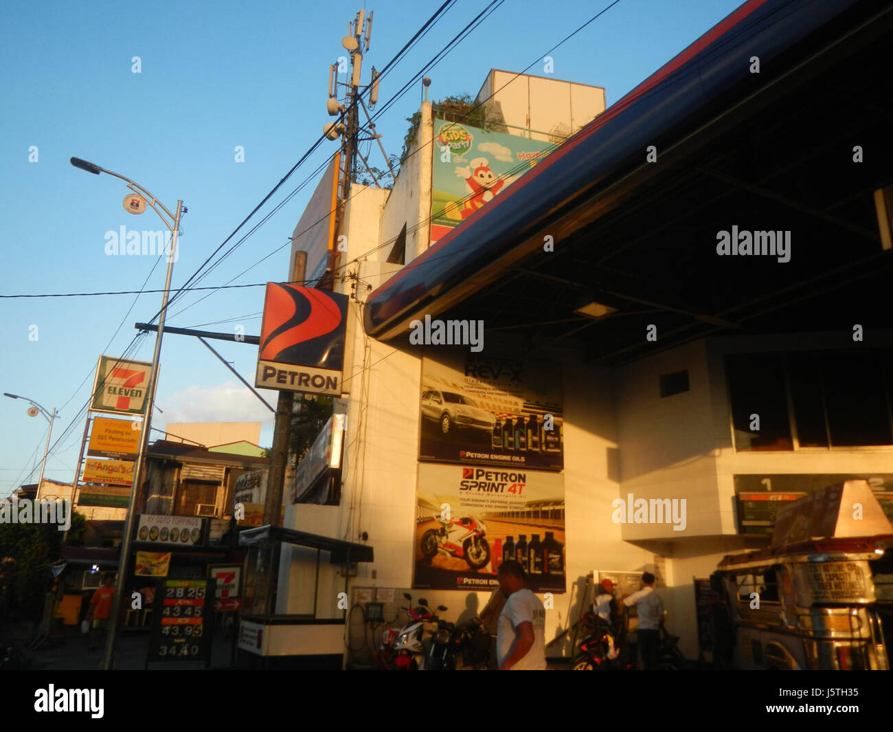 This image captures a sunset view over Kalentong, Santa Ana, and ...