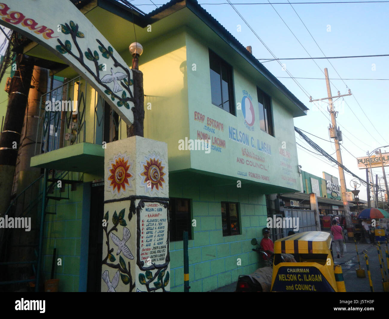 This image depicts a sunset over the Kalentong area in Santa Ana ...