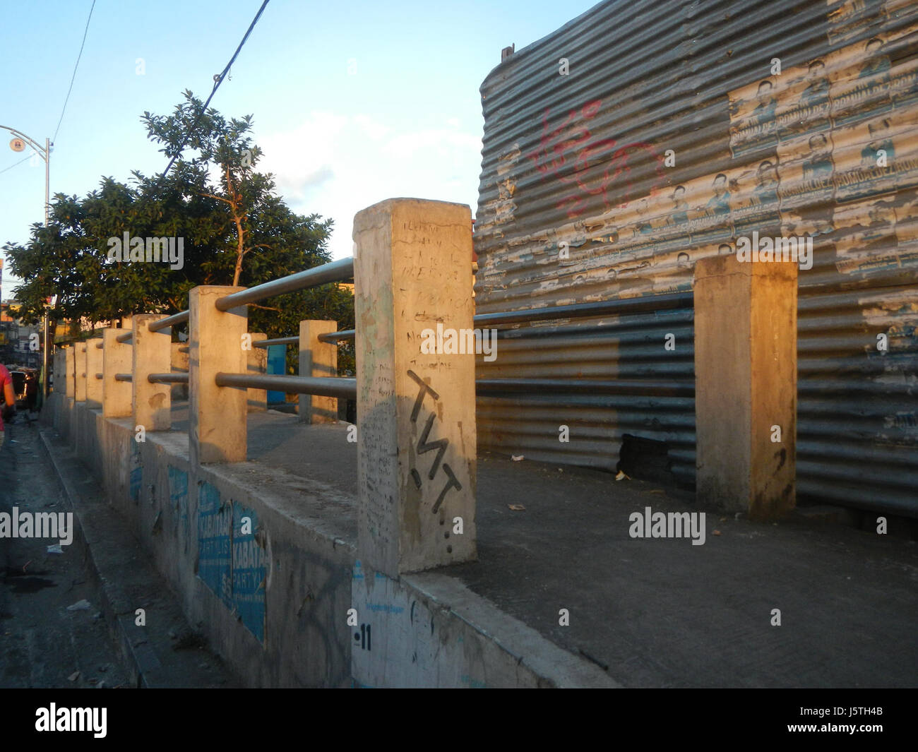 This image captures a stunning sunset over Kalentong, Santa Ana, and ...