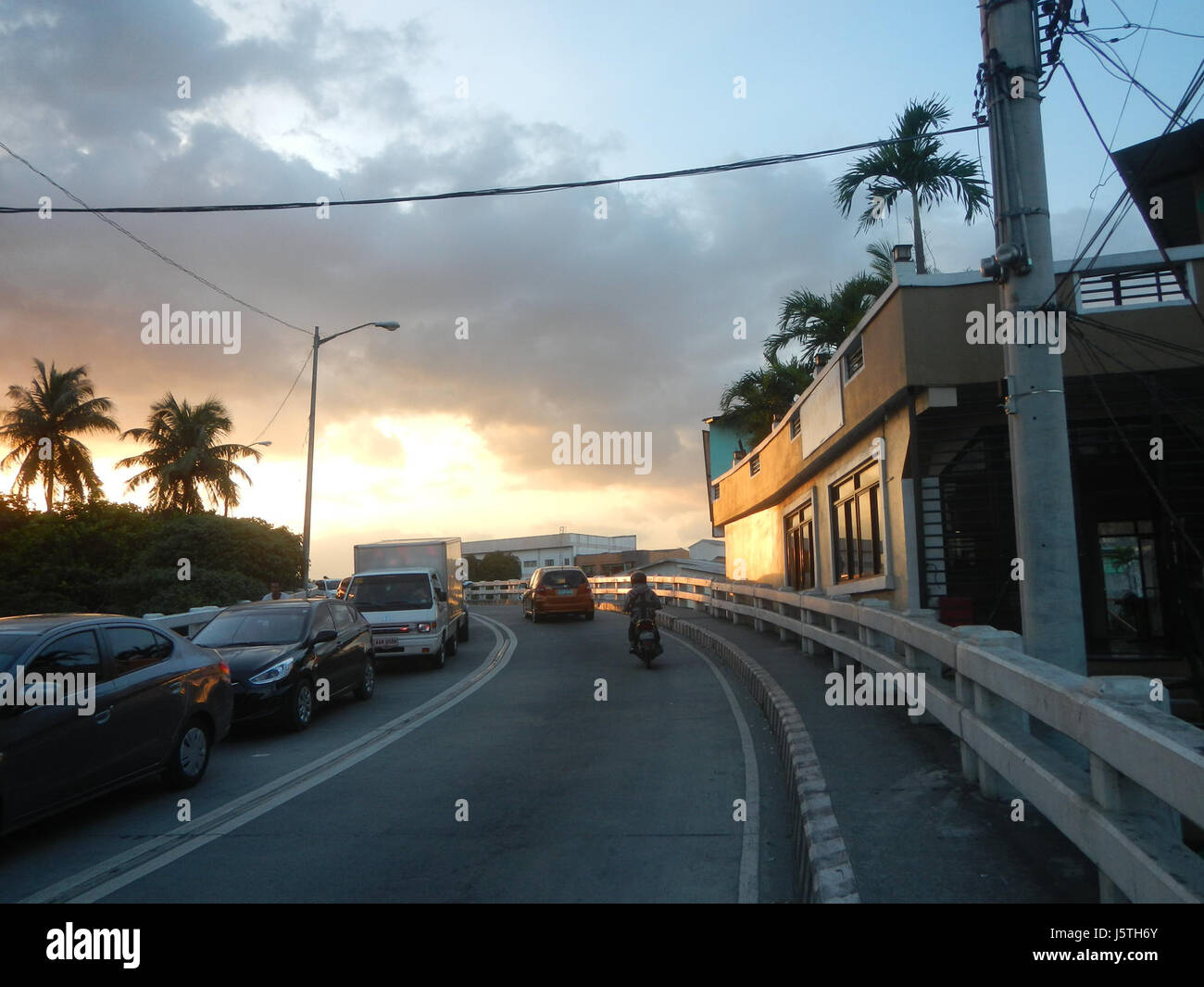 This photograph captures the stunning sunset view over Kalentong and ...