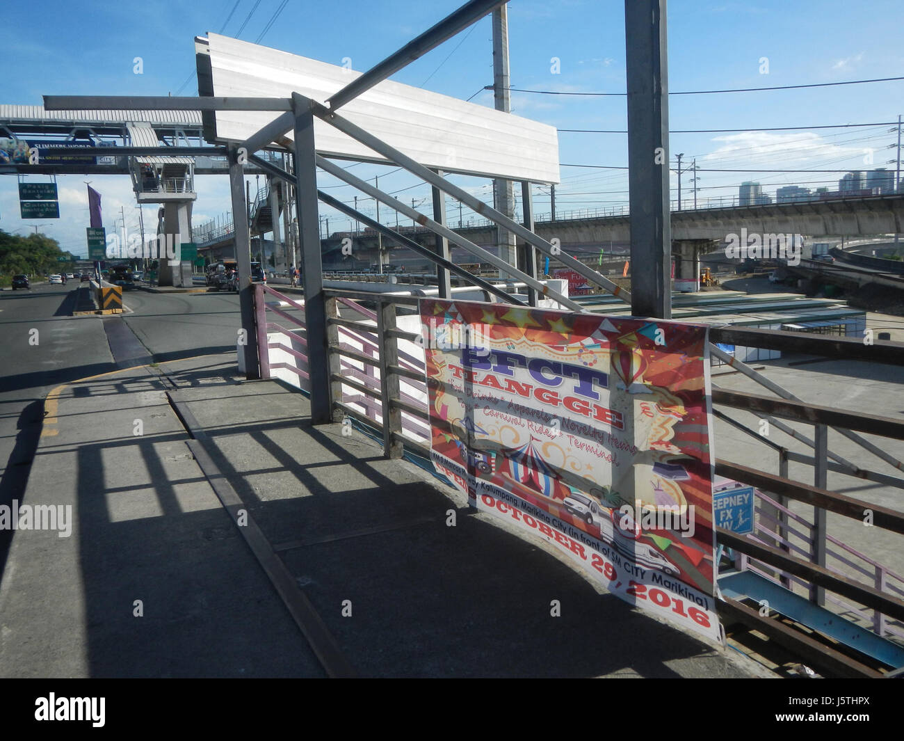 The footbridge shown spans over the Marcos Highway Bridge in Marikina ...