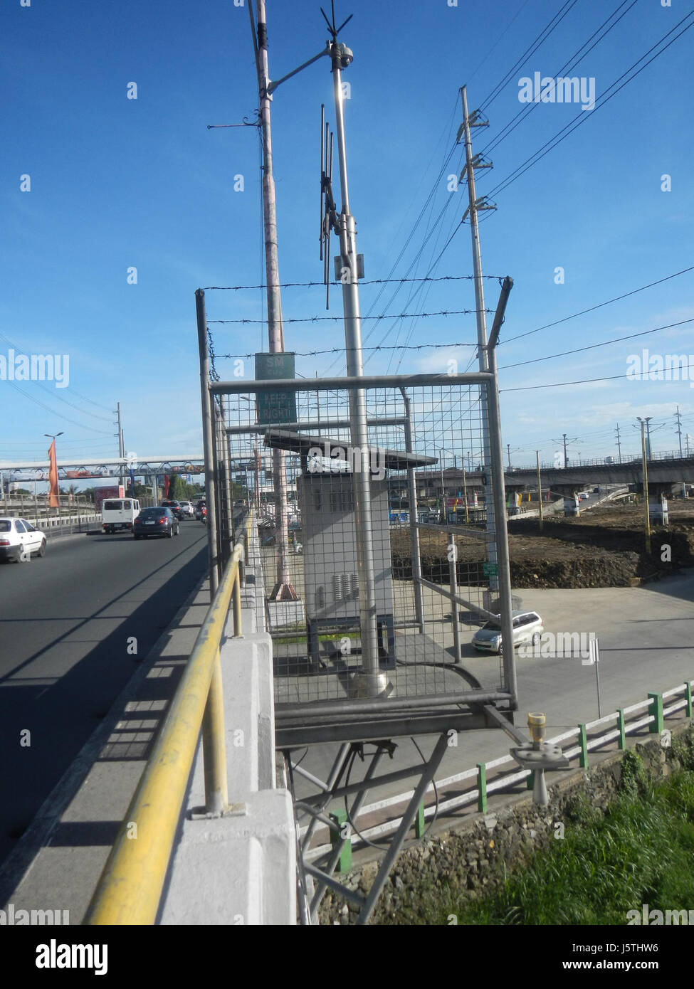 This image shows the footbridge on Marcos Highway in Marikina City ...