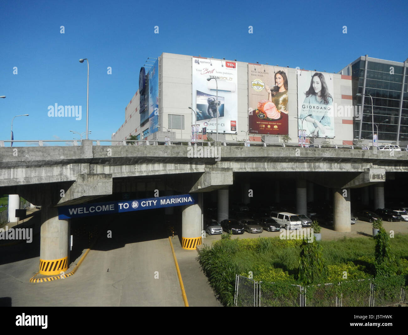 This photograph shows the footbridge crossing over the Marcos Highway ...
