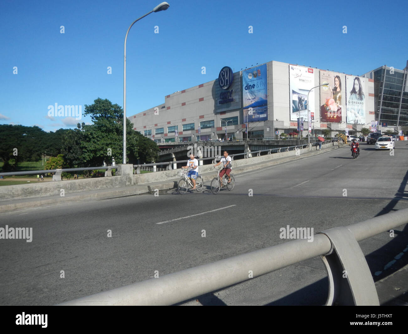 This image shows the Marcos Highway Bridge in Marikina City ...