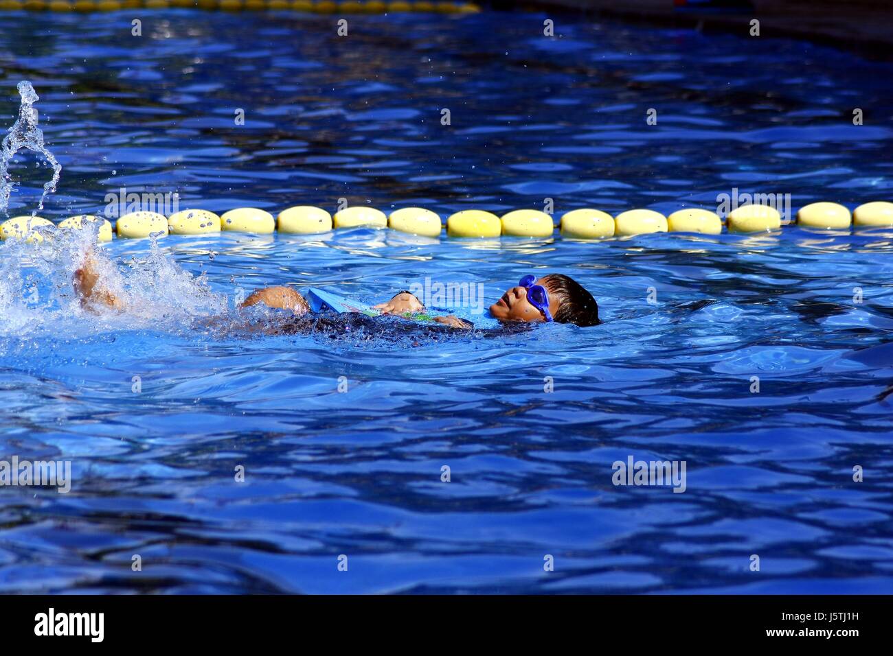 Swimmer kickboard hi-res stock photography and images - Alamy