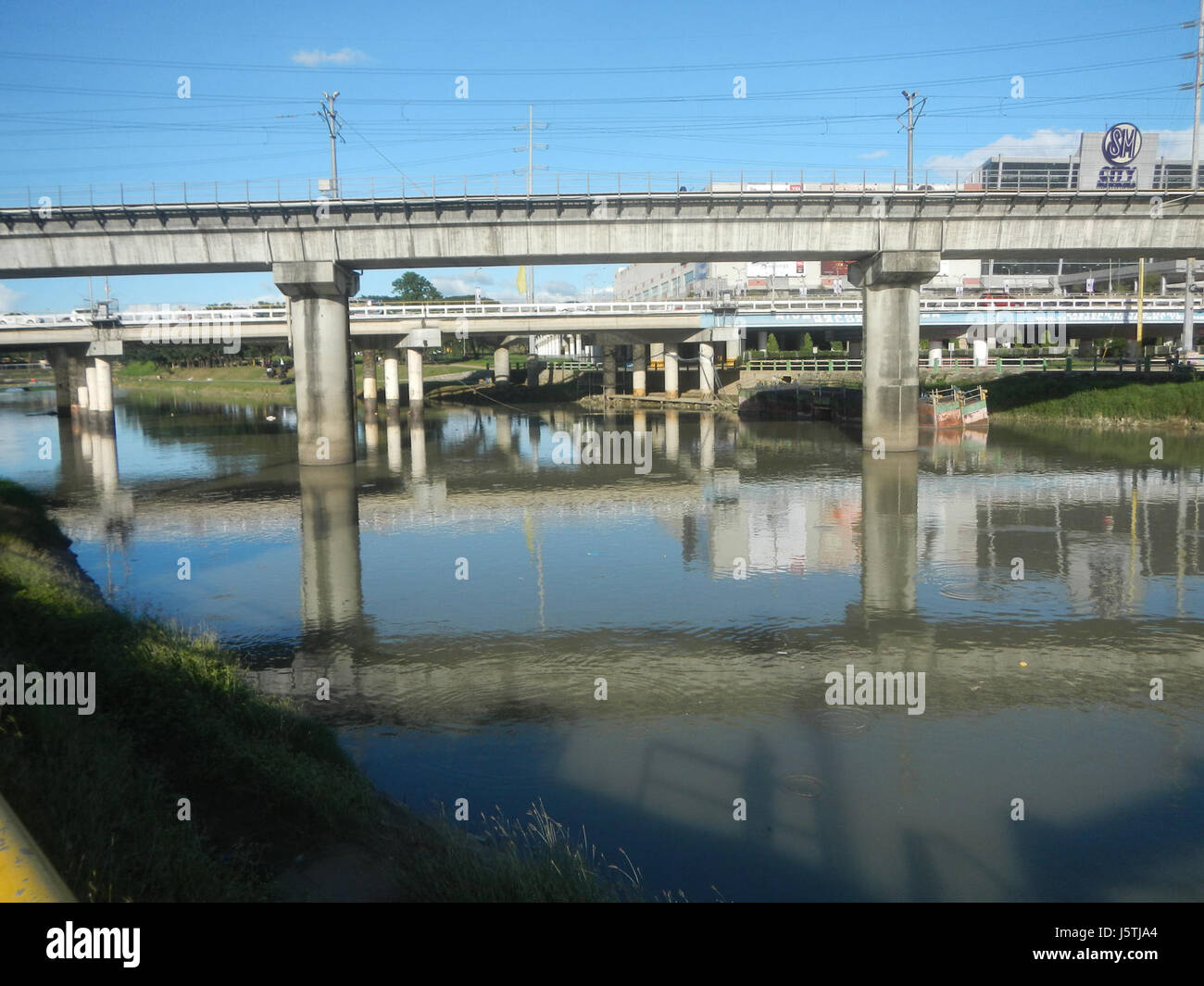 An urban image showing the Barangay Industrial Valley Complex near LRT ...
