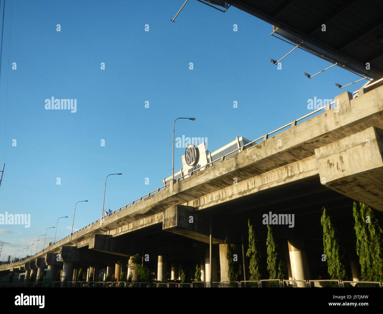 This image shows the SM City Marikina Flyover and the Marcos Bridge ...